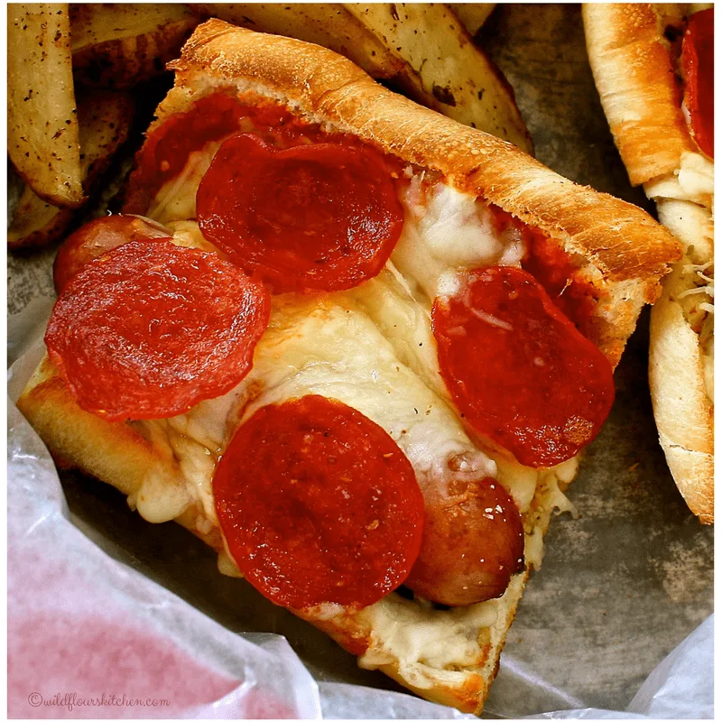 Pesto & Pepperoni Pizza Dogs on Garlic Bread - Wildflour's Cottage Kitchen